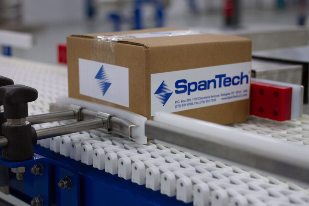 Conveyor Squeeze Stops & Pushers | Span Tech Conveyors